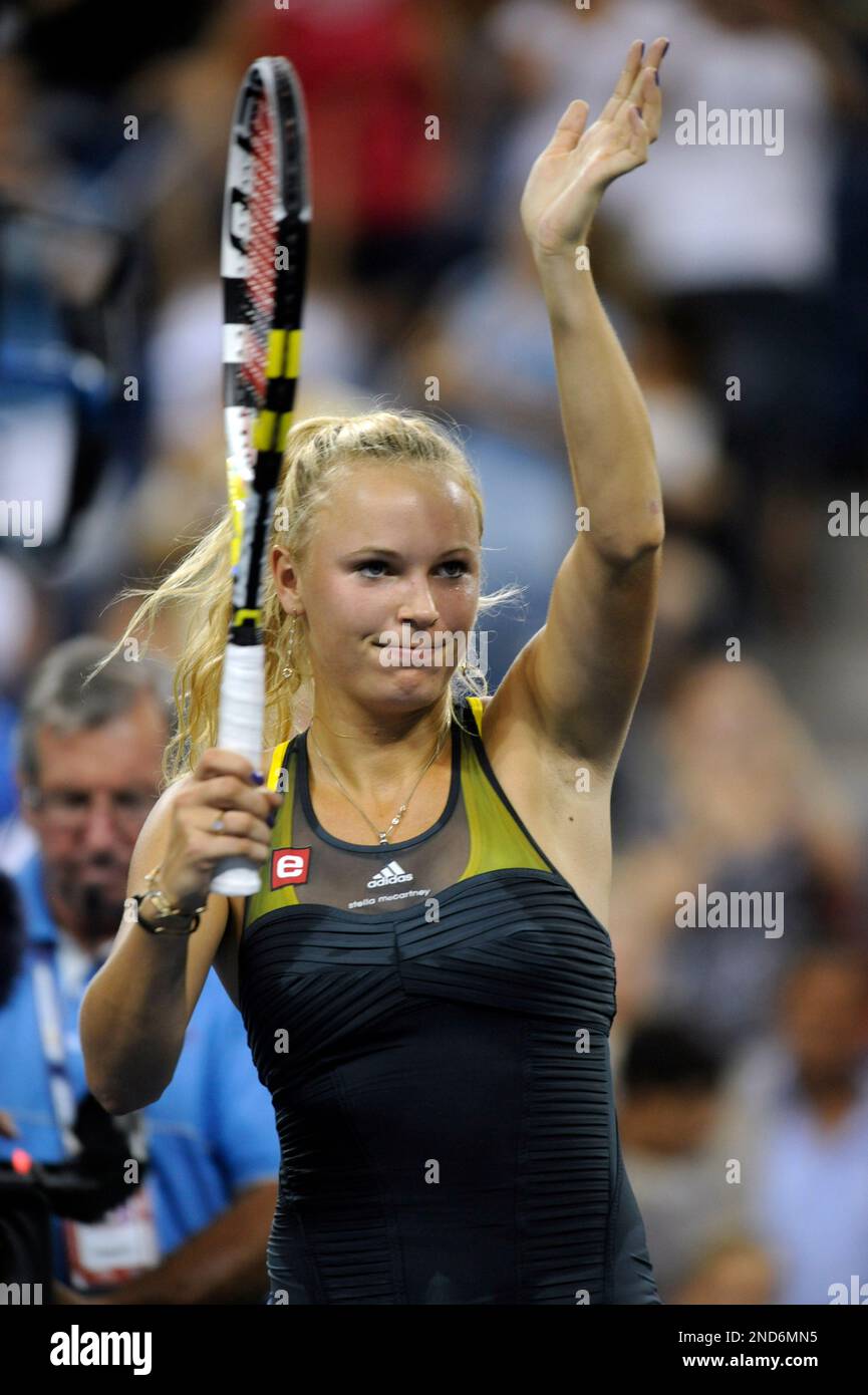 Caroline Wozniacki of Denmark acknowledges the crowd after her 6-1, 6-1 ...