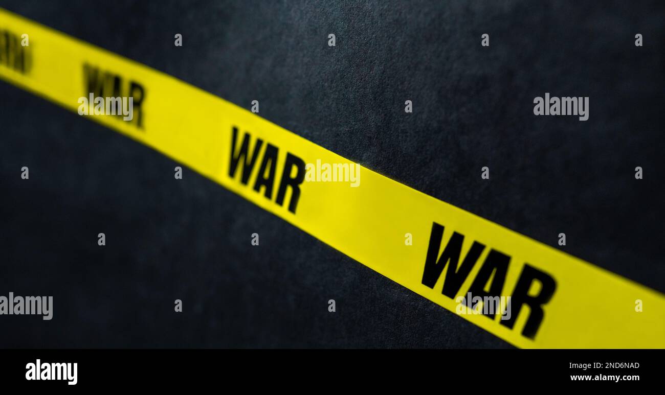Tape with war text Stock Photo - Alamy