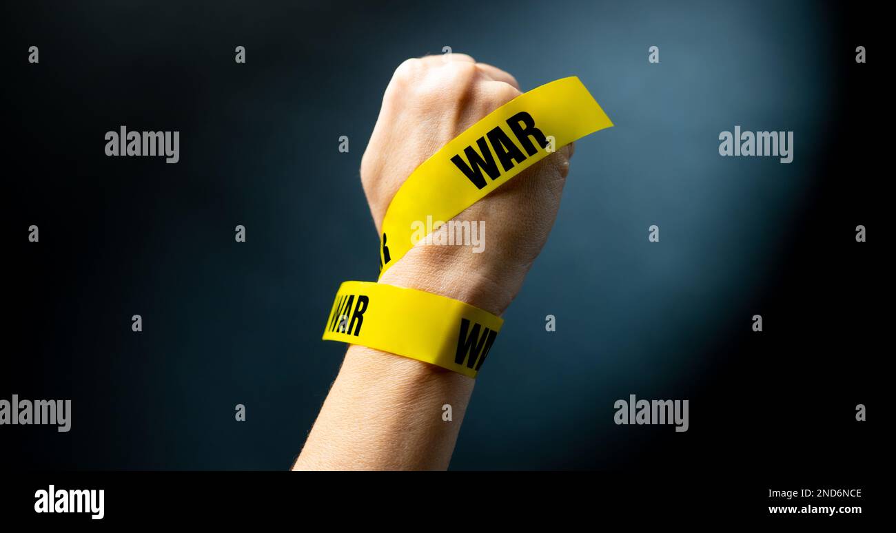 Tape with war text Stock Photo - Alamy
