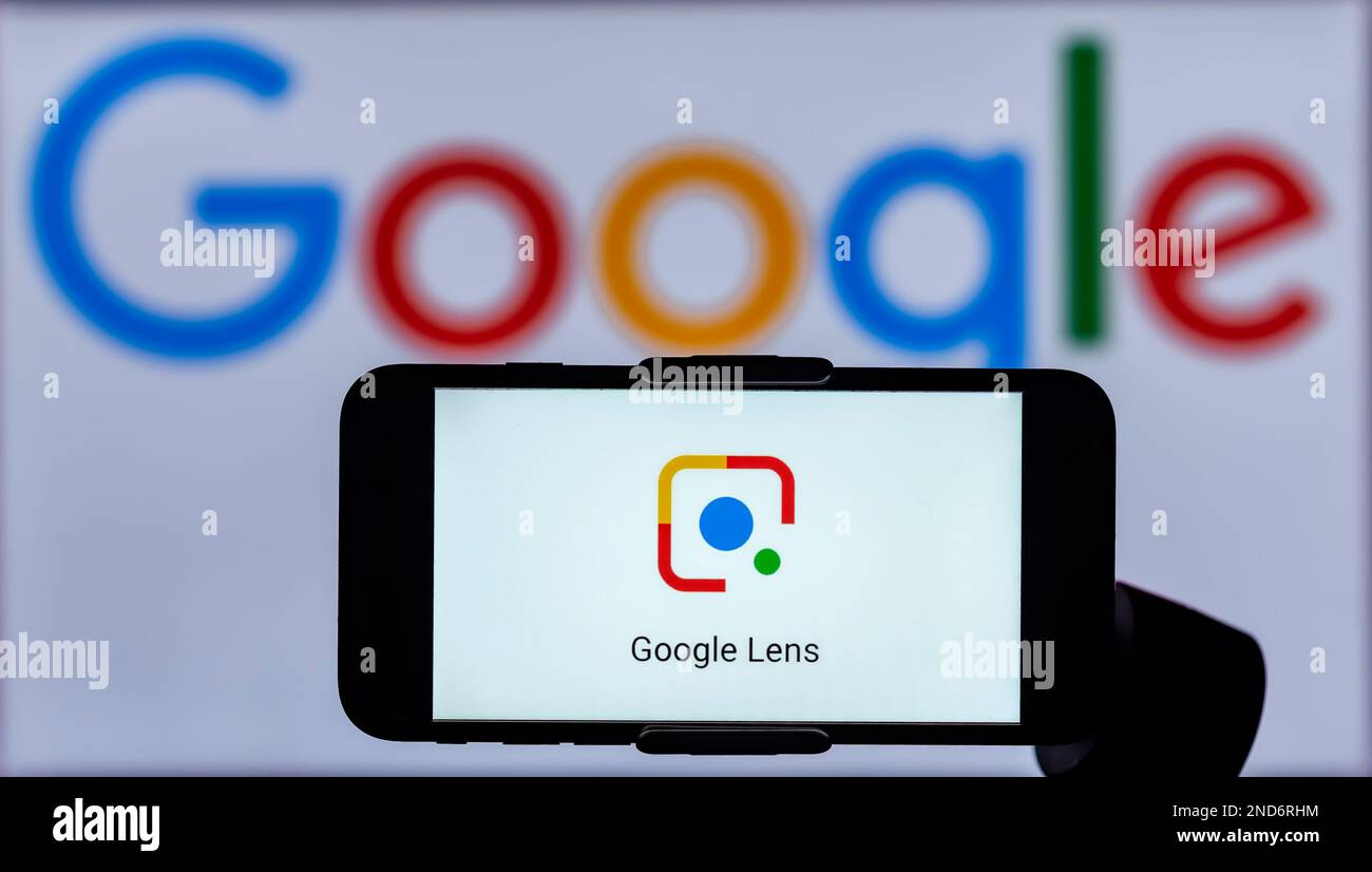 In this photo illustration, the logo of Google Lens is seen displayed ...