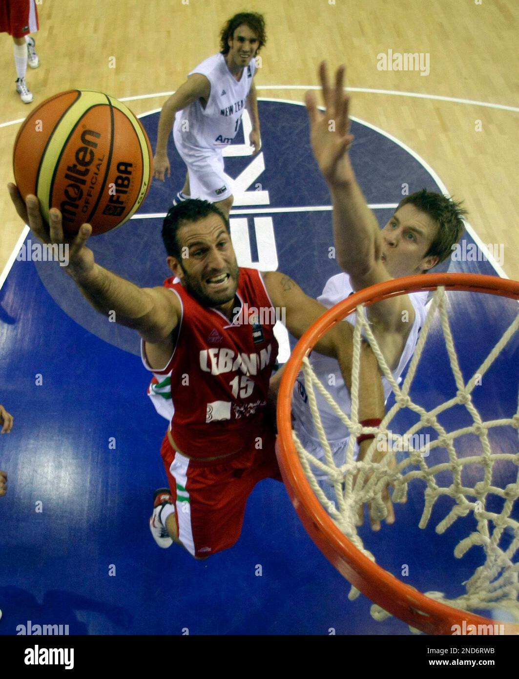 Lebanon’s Fadi El Khatib, left, drives to the basket as he is guarded ...