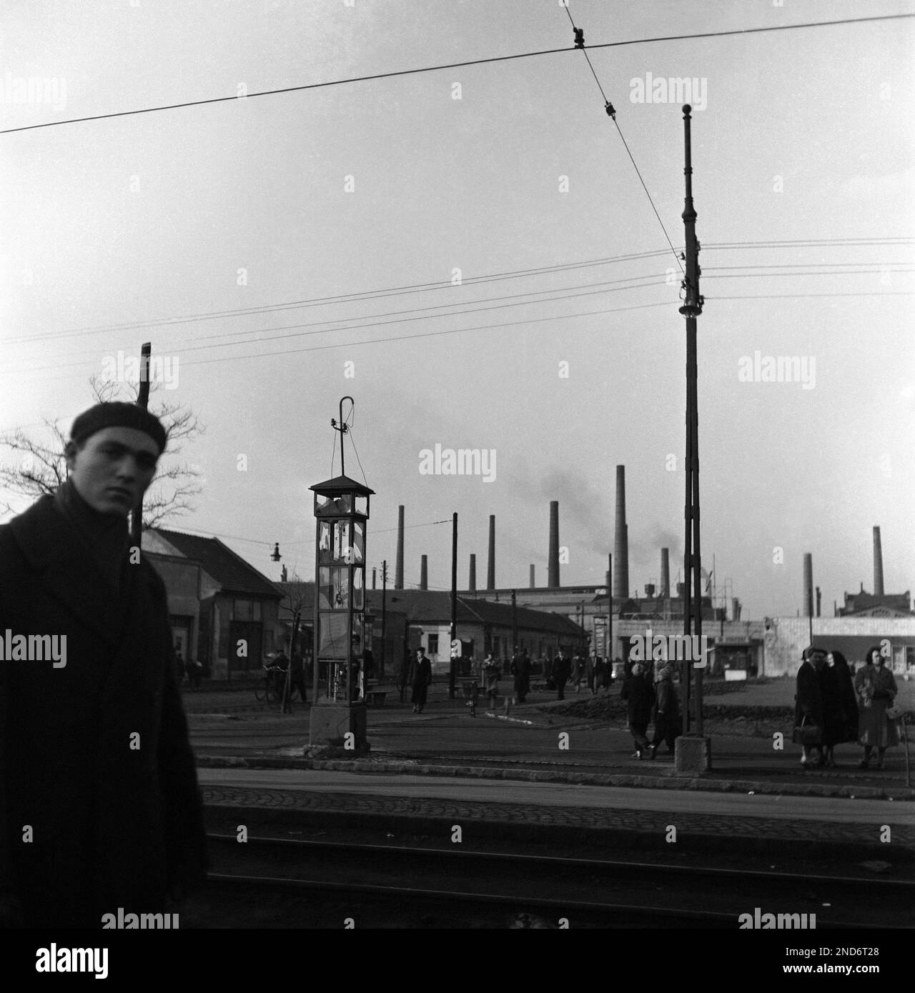 Hungarian workers walk out of the huge iron and steel works in Csepel ...