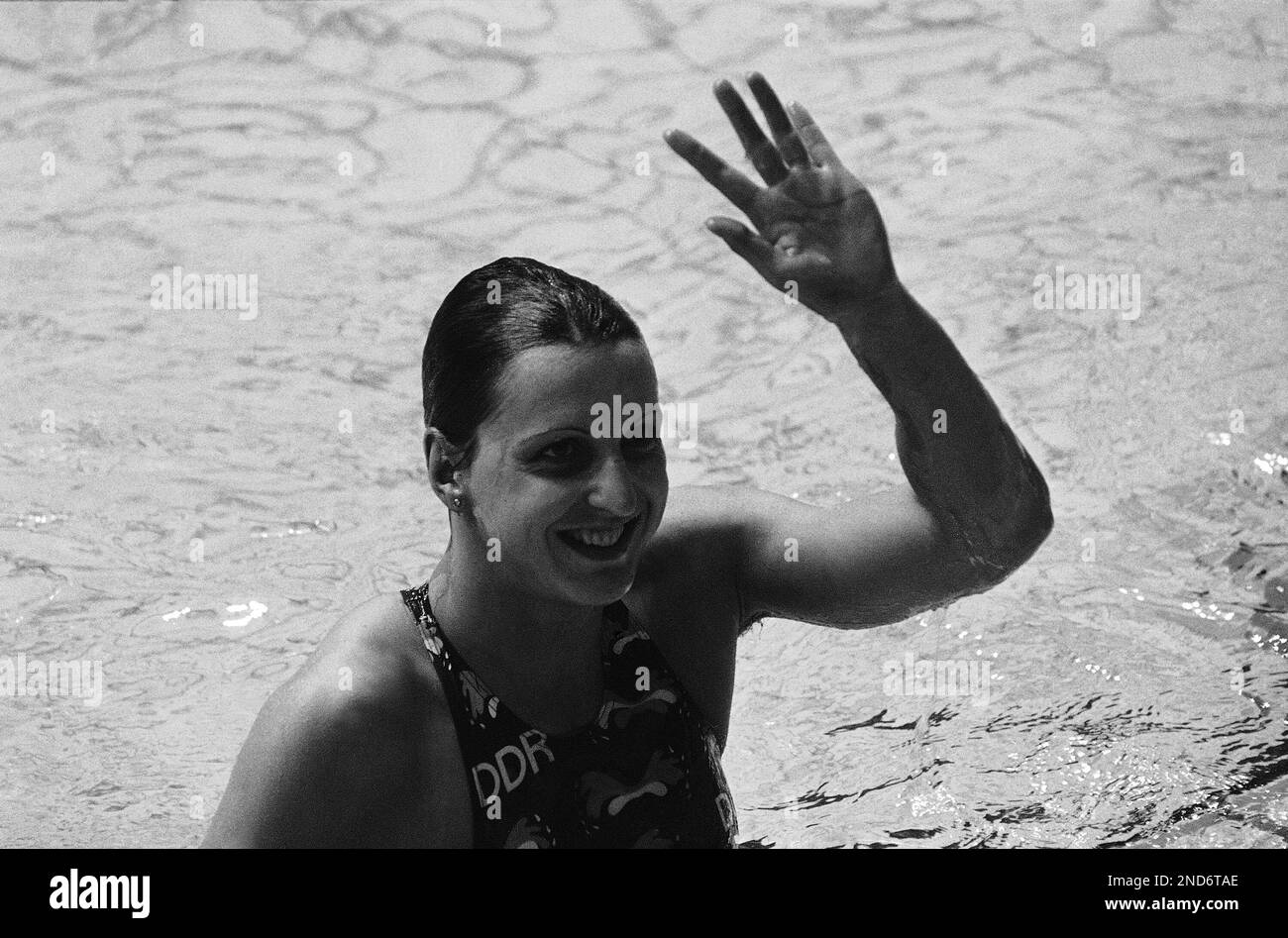 East Germany’s star swimmer Barbara Krause smiles as she waves to crowd ...