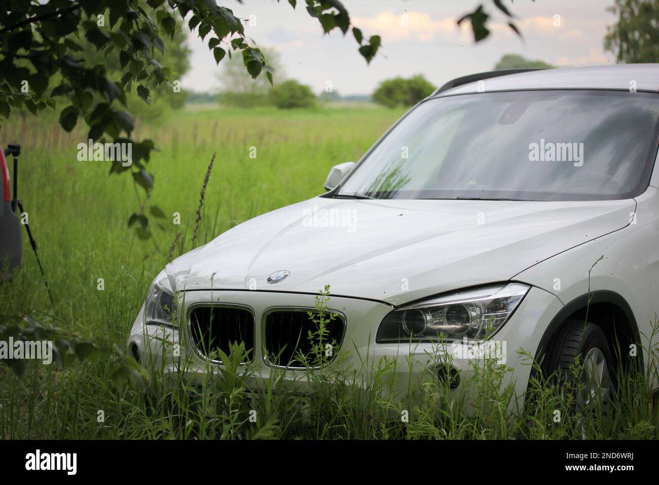 Kyiv, Ukraine. 1 May 2021 White SUV car in nature. Driving in the ...
