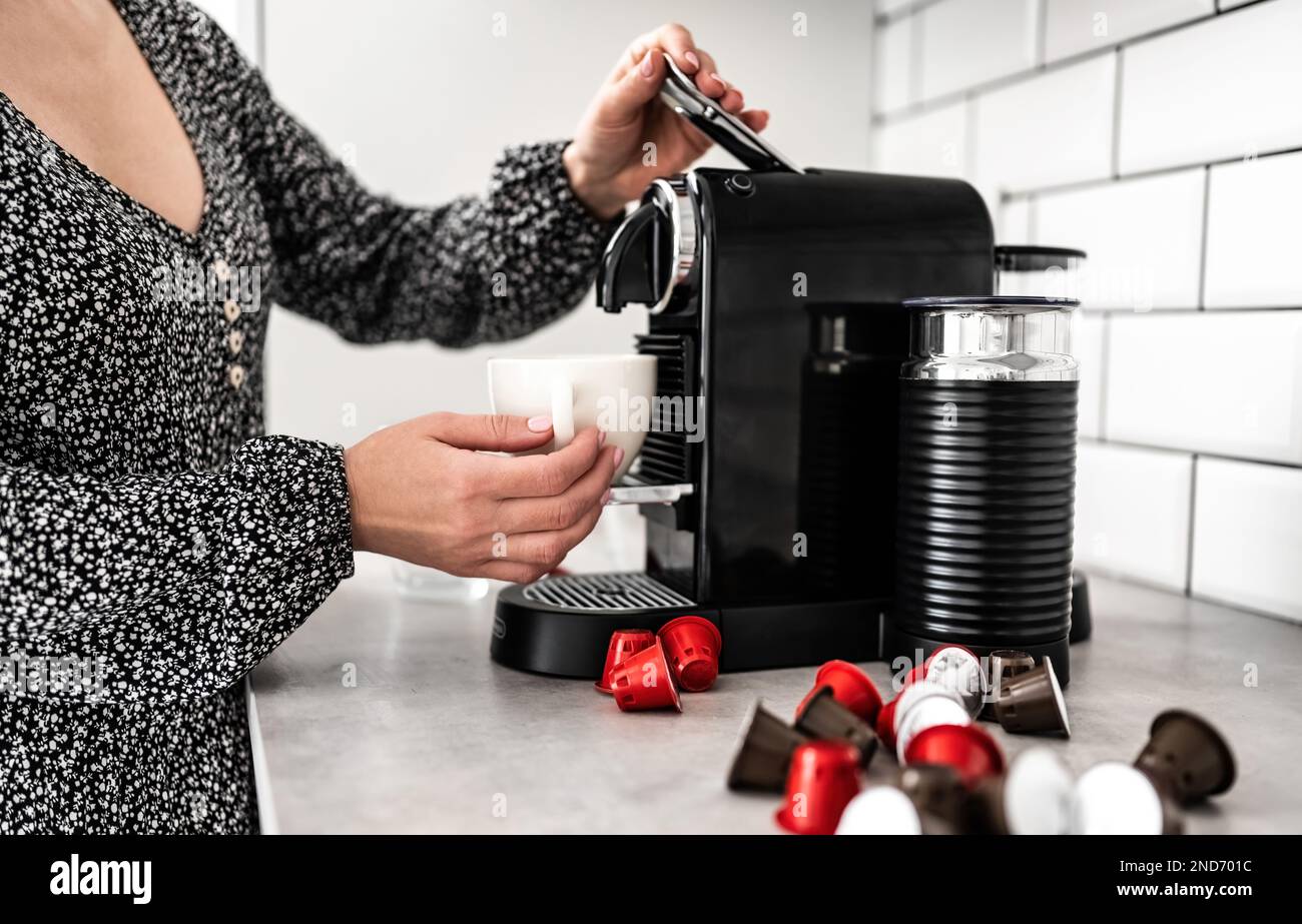 Capsule coffee machine at domestic kitchen Stock Photo - Alamy