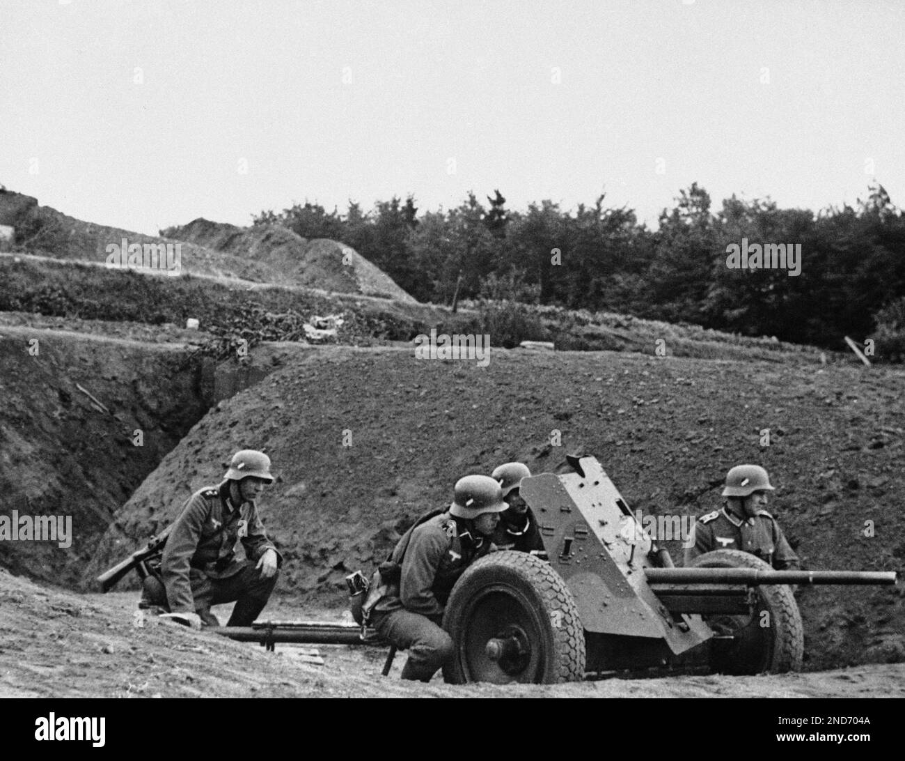 Armored gun is brought from below in firing position in Germany on Nov ...