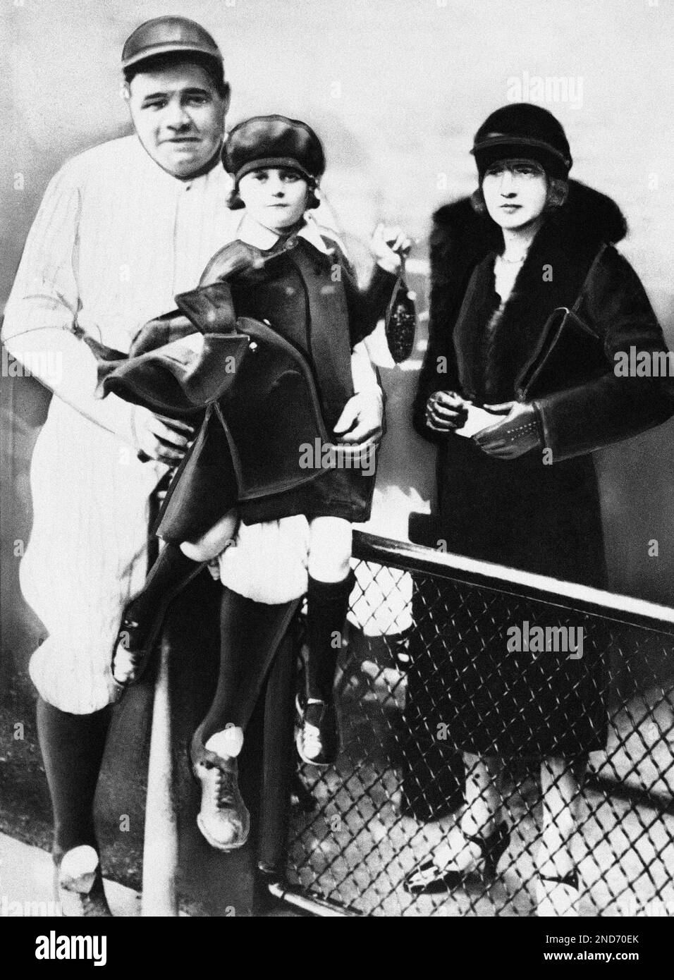George Herman “Babe” Ruth stands with his daughter, Dorothy, and his ...