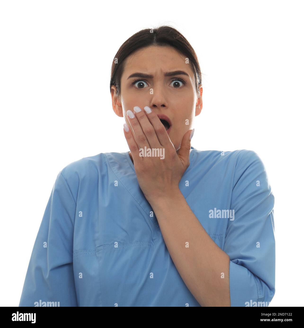 Portrait of nurse feeling fear on white background Stock Photo - Alamy