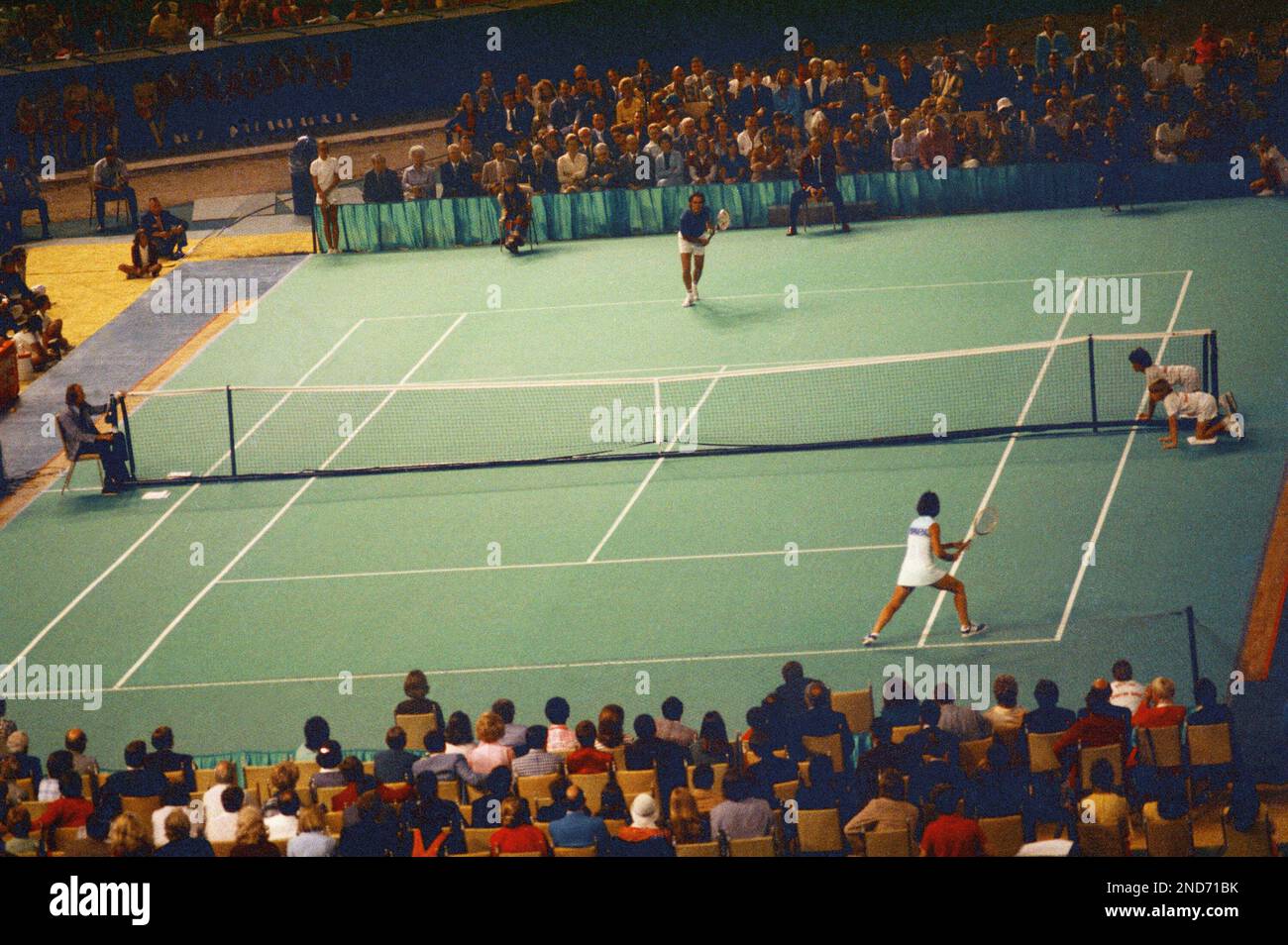 Tennis Star Bobby Riggs Top And Billie Jean King Are Shown In Action