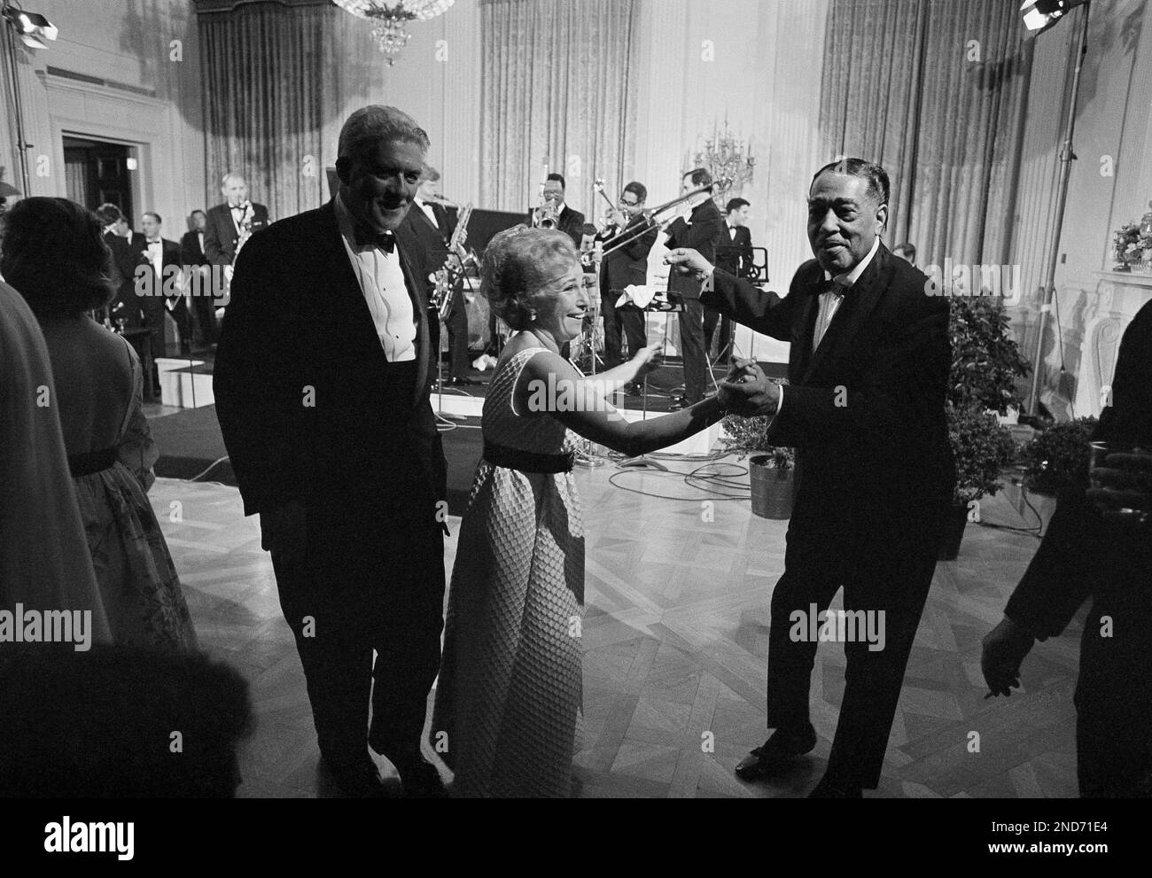 Duke Ellington dancing with Mrs. Joe Williams, wife of singer, during ...