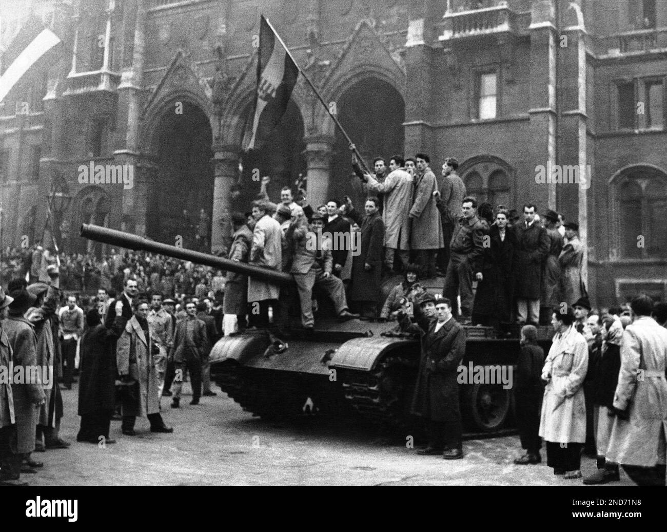 Rebels wave the Hungarian tricolour, with the Kossuth symbol bearing ...