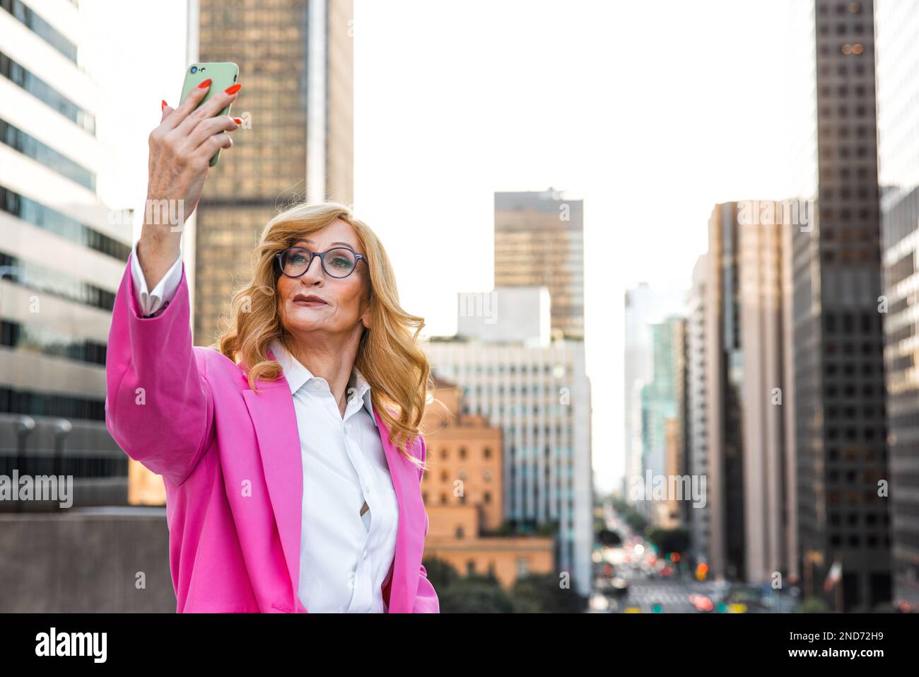 Transgender business woman lifestyle moments in downtown, Los angeles ...