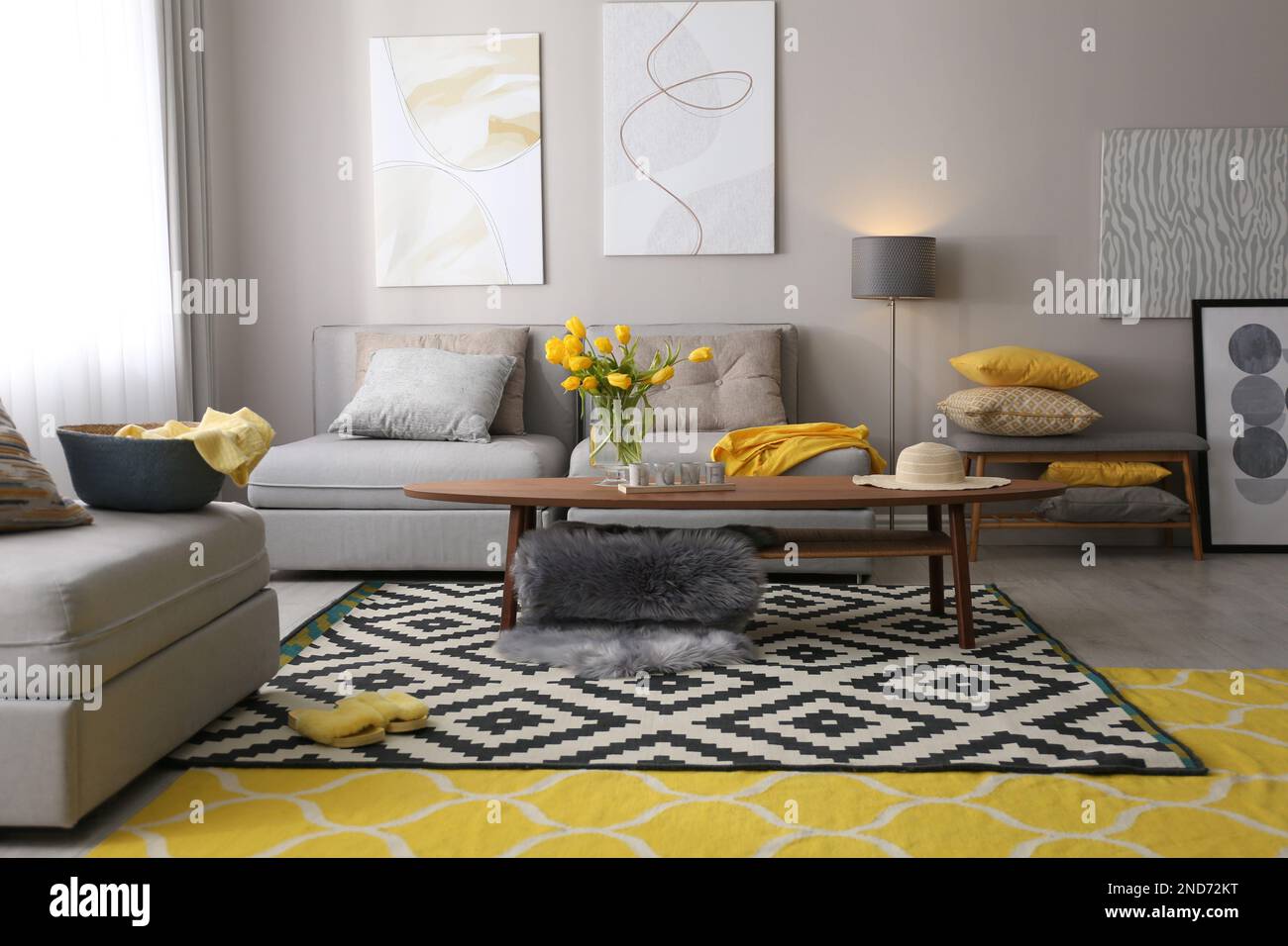 Stylish living room interior with comfortable sofa. Interior design in ...