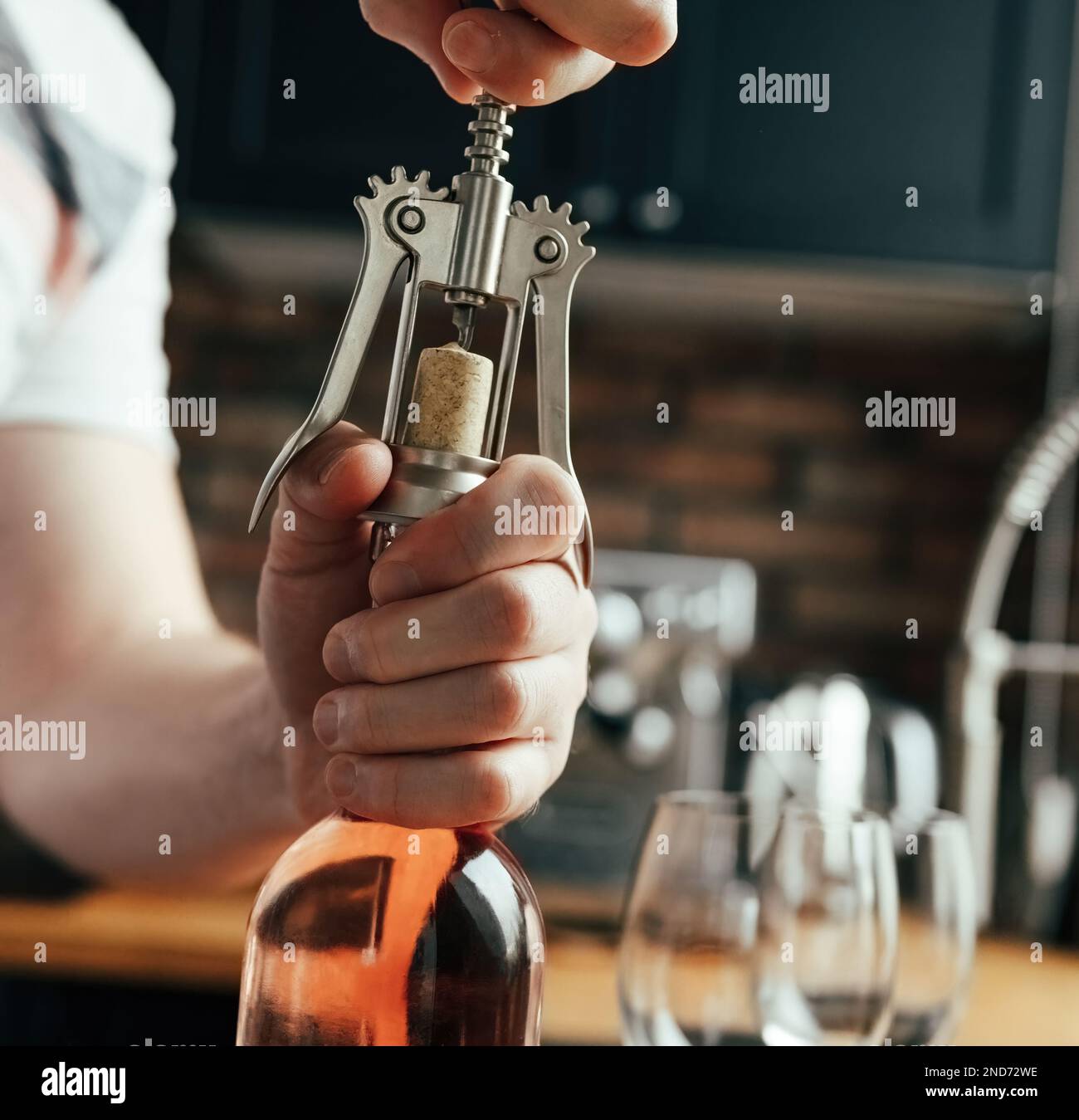 Old man filling bottle hi-res stock photography and images - Alamy