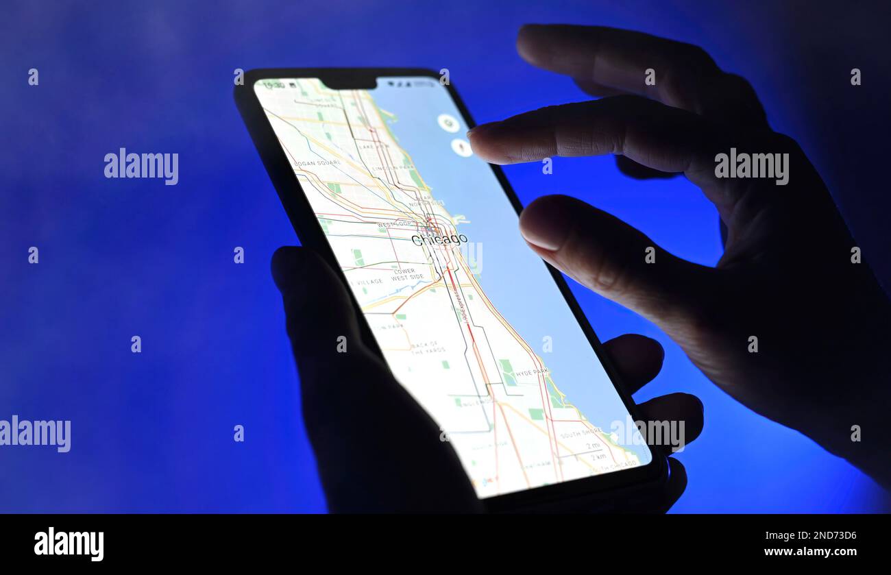 Girl using google maps app on a smartphone Stock Photo - Alamy