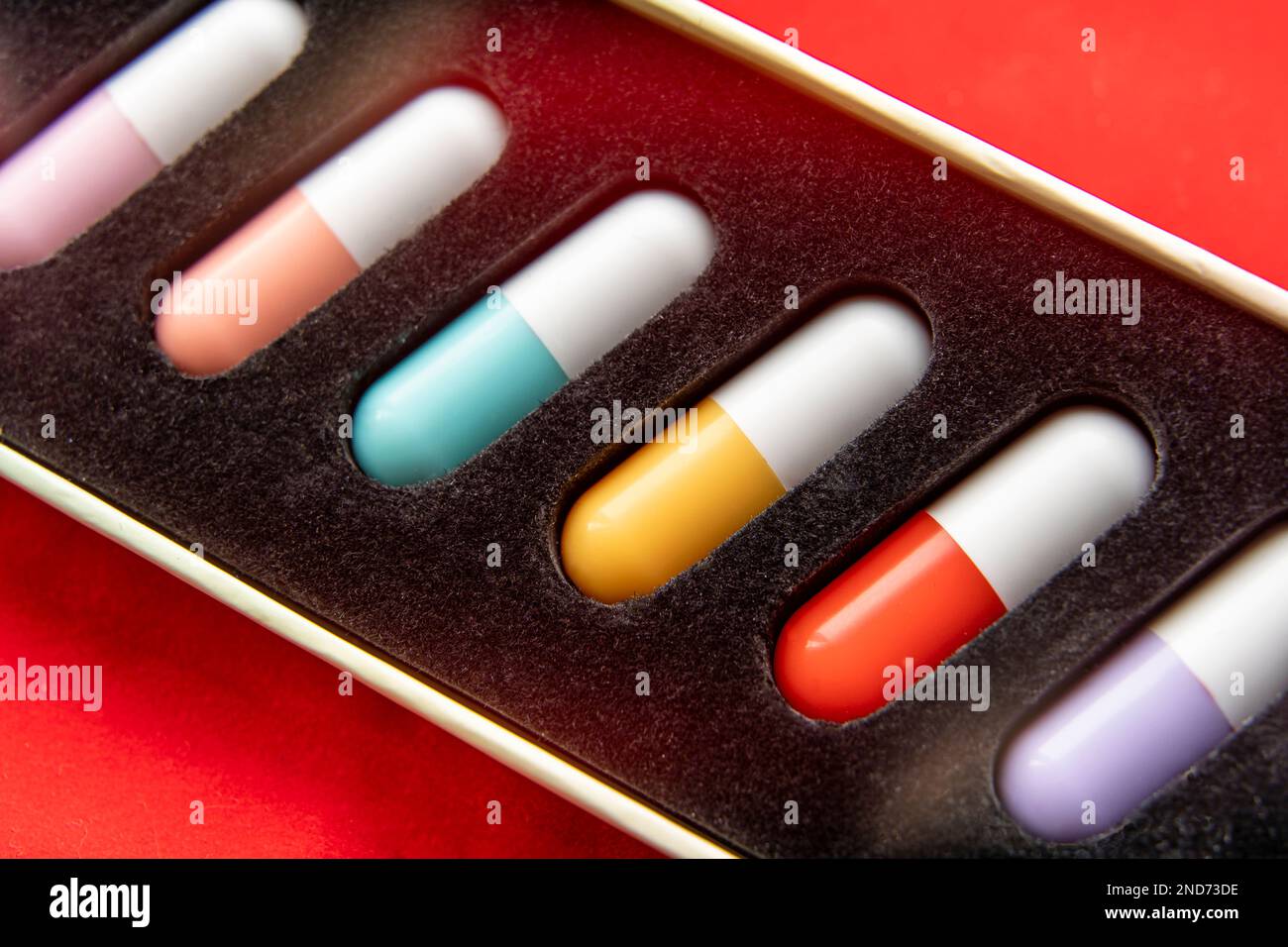 a set of tablets, vitamins in capsules lying in a special box Stock ...