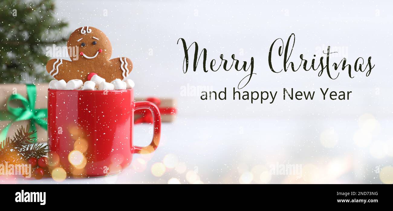 Merry Christmas and Happy New Year. Gingerbread man in red cup with ...
