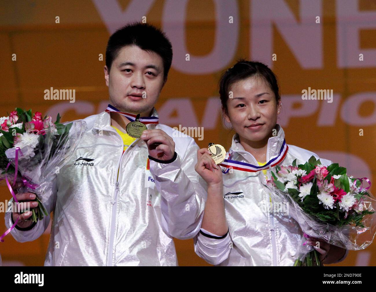 China's Bo Zheng, left, and Jin Ma pose with their gold medals after ...