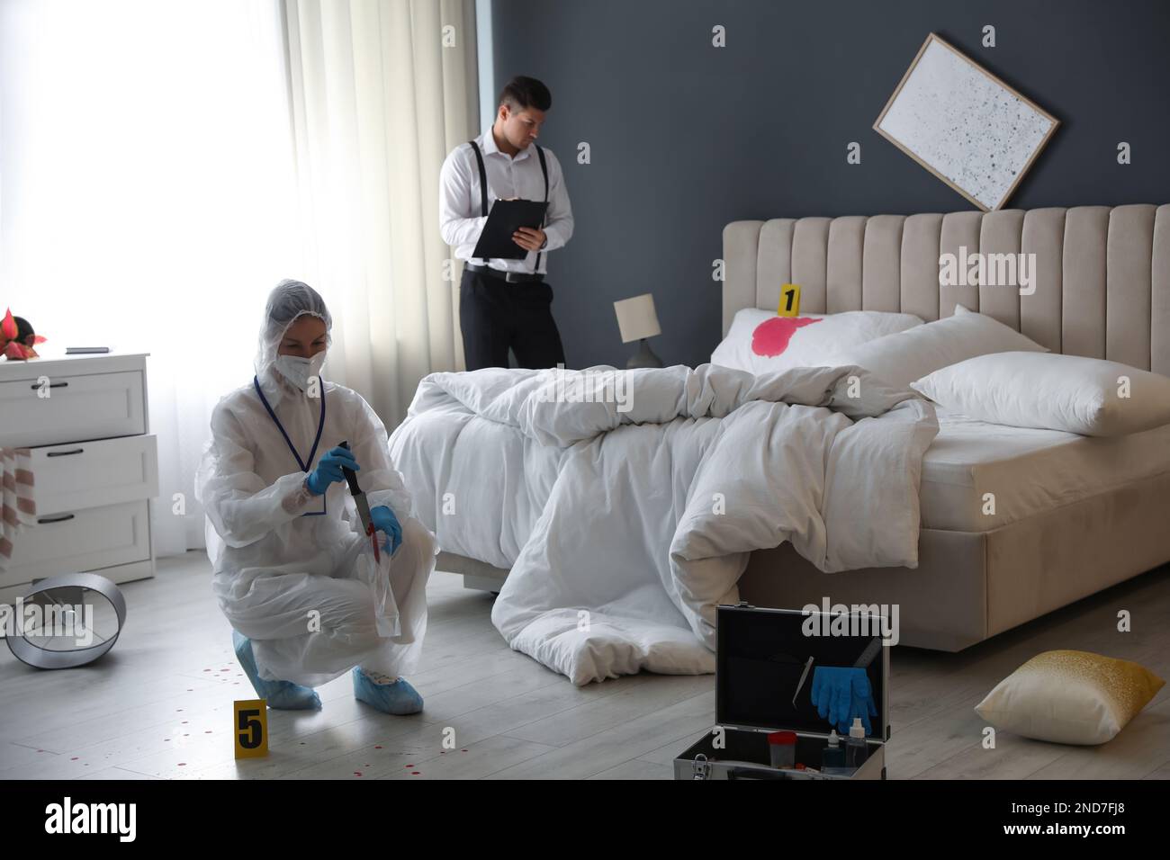 Investigators working at crime scene in messy room Stock Photo - Alamy