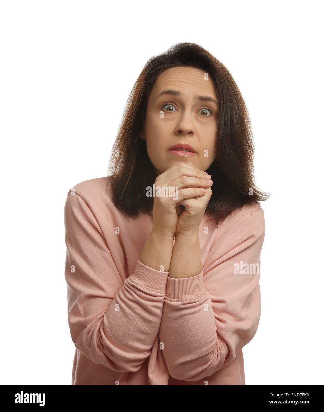 Mature woman feeling fear on white background Stock Photo - Alamy