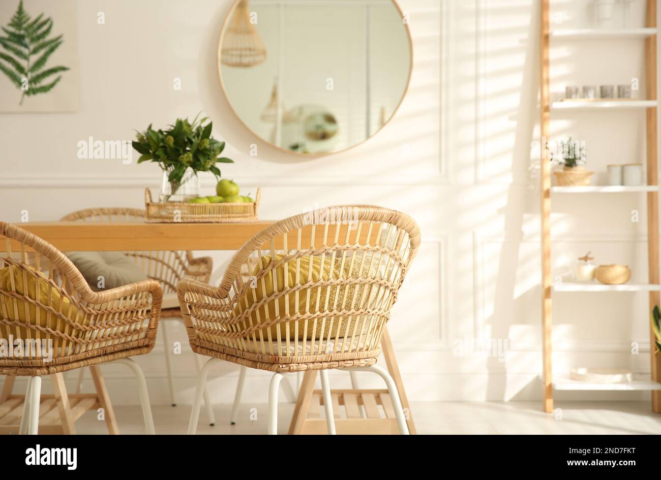 Stylish wooden dining table and chairs in room. Interior design Stock ...