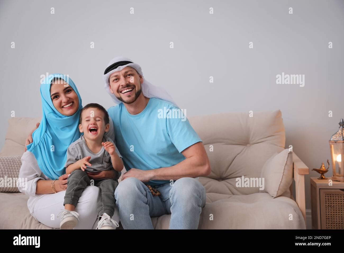 Arab family in living room hi-res stock photography and images - Alamy