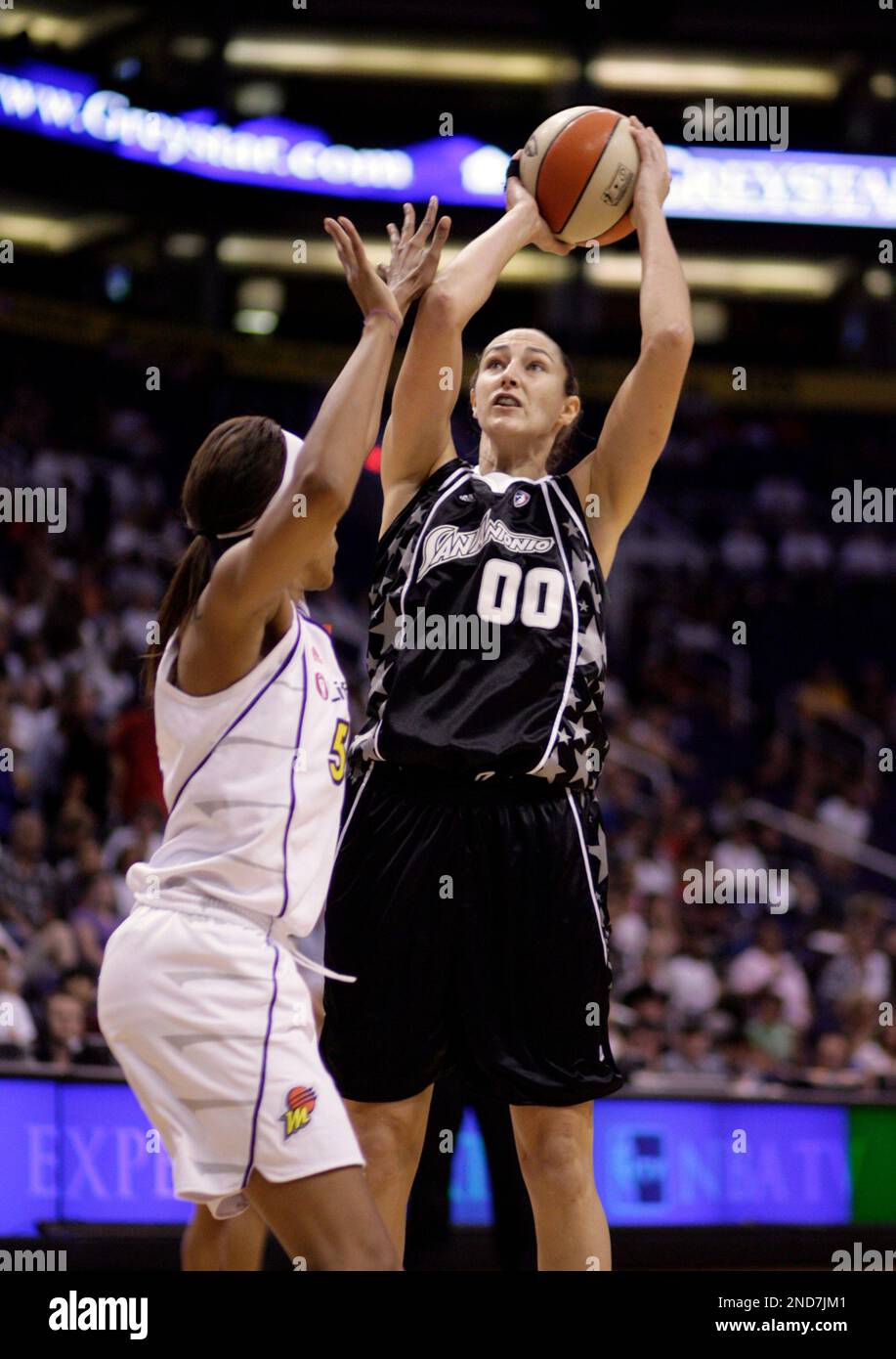 San Antonio Silver Stars' Ruth Riley, right, against Phoenix Mercury's ...
