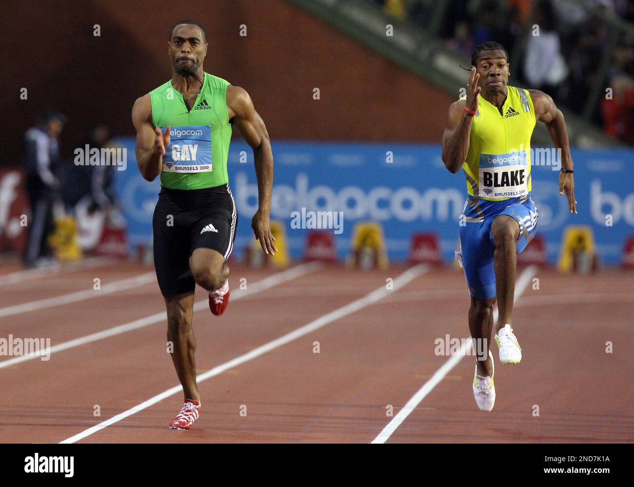 U.S. Tyson Gay, left, and Jamaica's Yohan Blake compete during the men ...