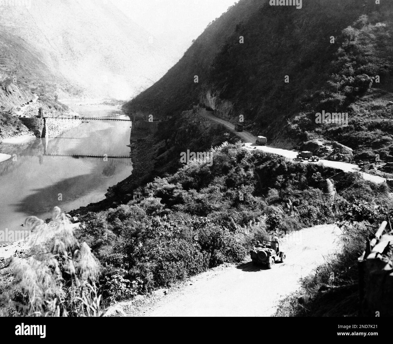 The first convoy to China over the Ledo-Burma Road, moves slowly down ...