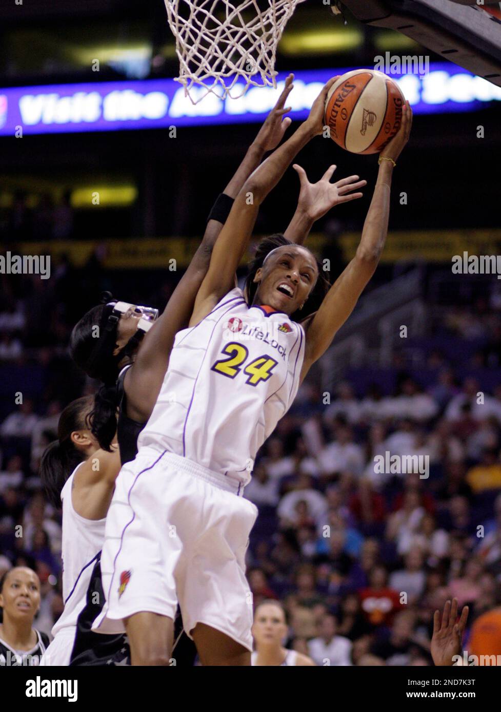 Phoenix Mercury's DeWanna Bonner, front, against San Antonio Silver ...
