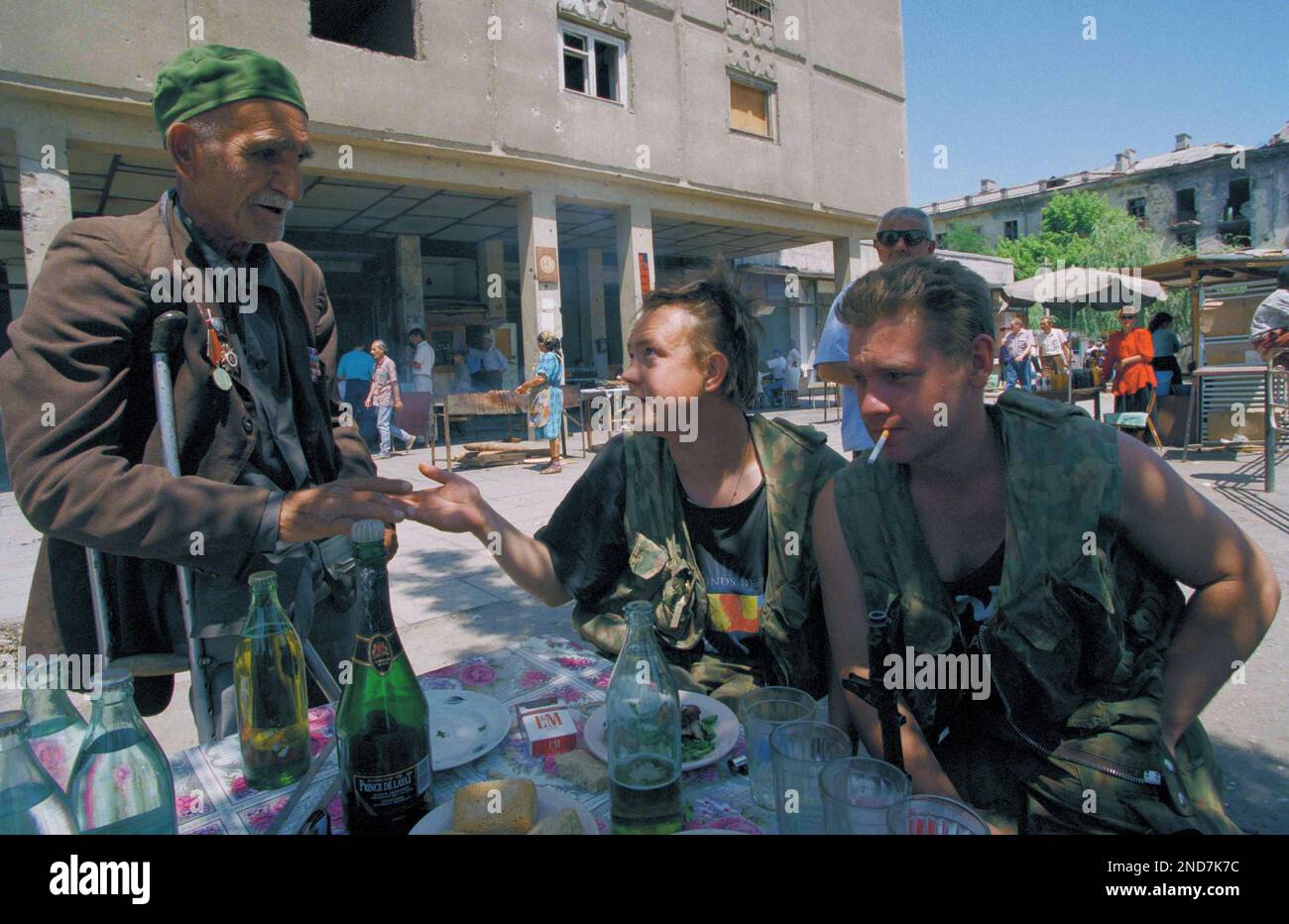 Two Russian Interior Ministry Forces paratroopers talk with an ...