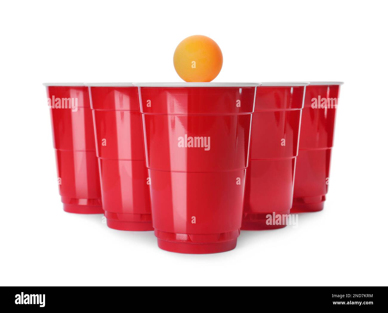 Red plastic cups and ball for beer pong on white background Stock Photo ...