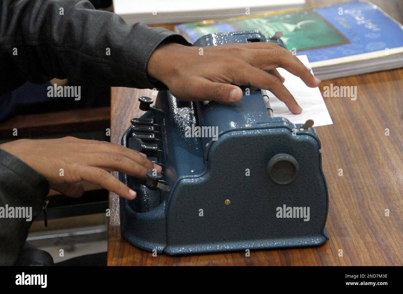 Blind students are busy in learning various skills education at a ...