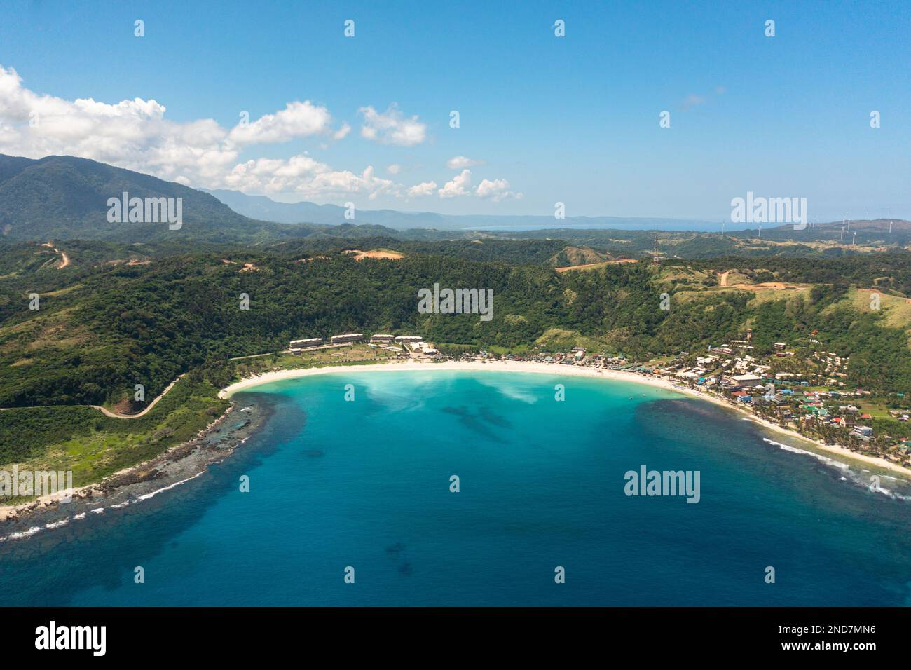 Aerial view of Blue lagoon with sandy beach. Pagudpud, Ilocos Norte ...