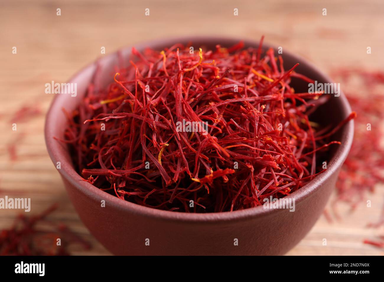 Saffron in in red bowl hi-res stock photography and images - Alamy