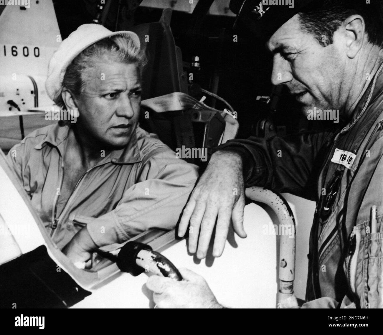 American Pilot Jacqueline Cochran receives a pre flight briefing from ...