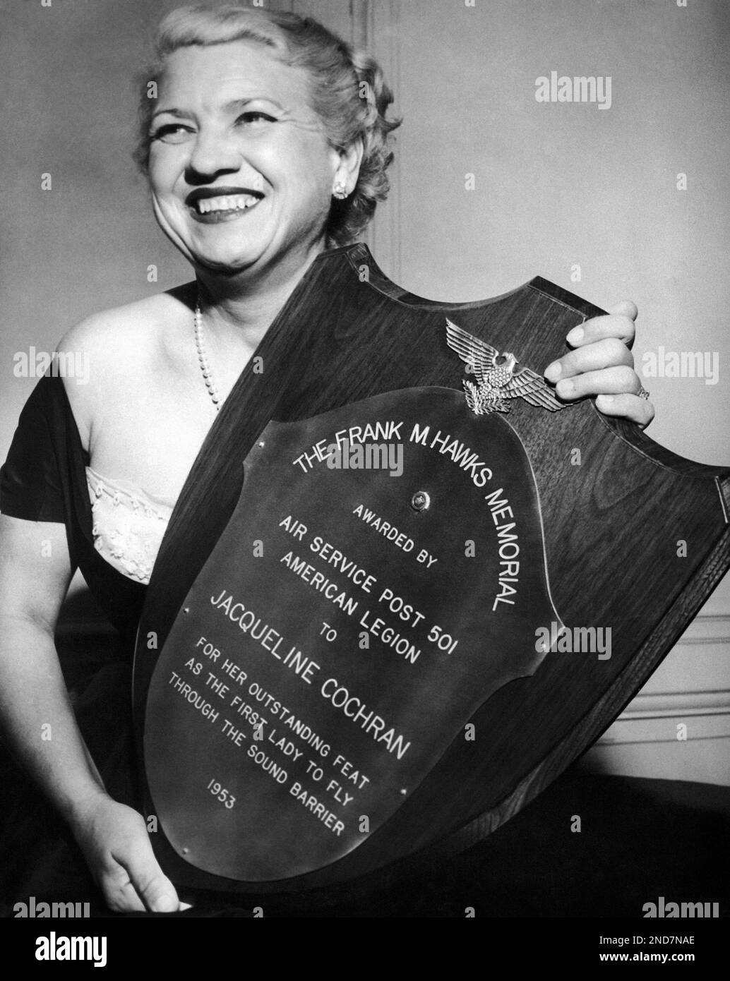 American pilot Jacqueline Cochran is all smiles as she holds the Frank ...