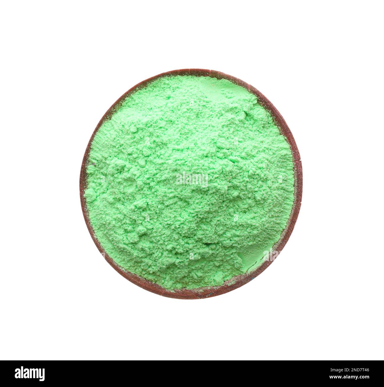 Green powder in bowl isolated on white, top view. Holi festival ...