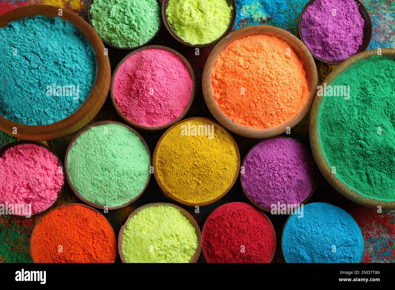 Colorful powder dyes as background, top view. Holi festival Stock Photo ...