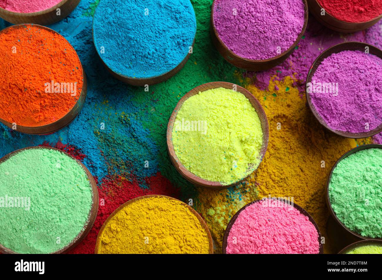 Colorful powder dyes as background, top view. Holi festival Stock Photo ...