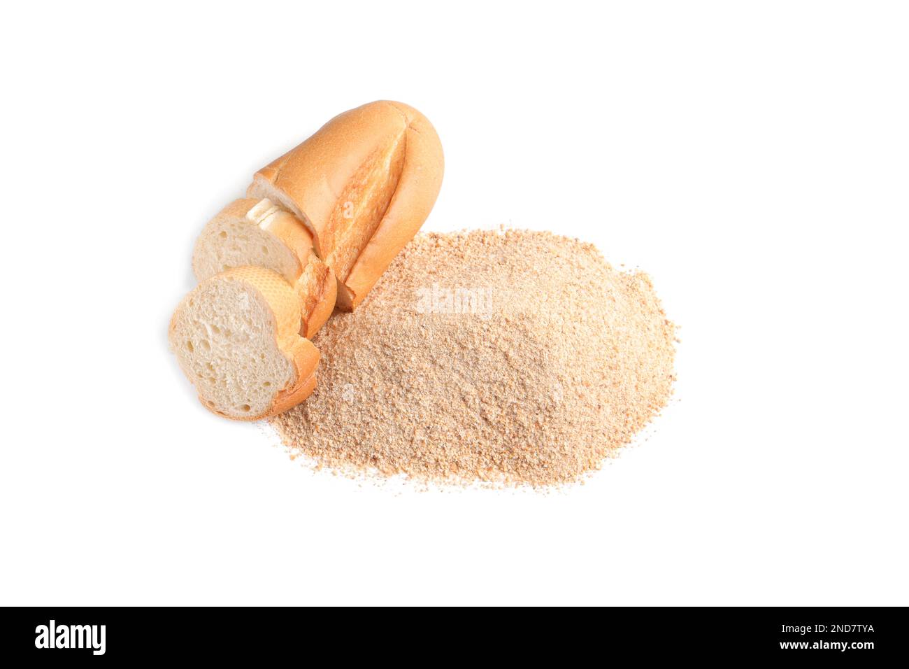 Pile of fresh bread crumbs and sliced loaf on white background, above ...