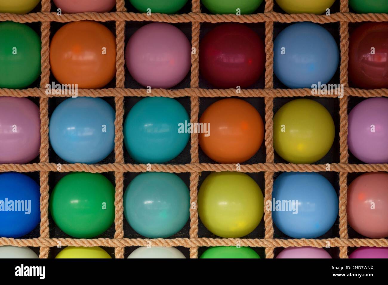 Row of balloons ready to be explode by customers at a fun fair Stock ...