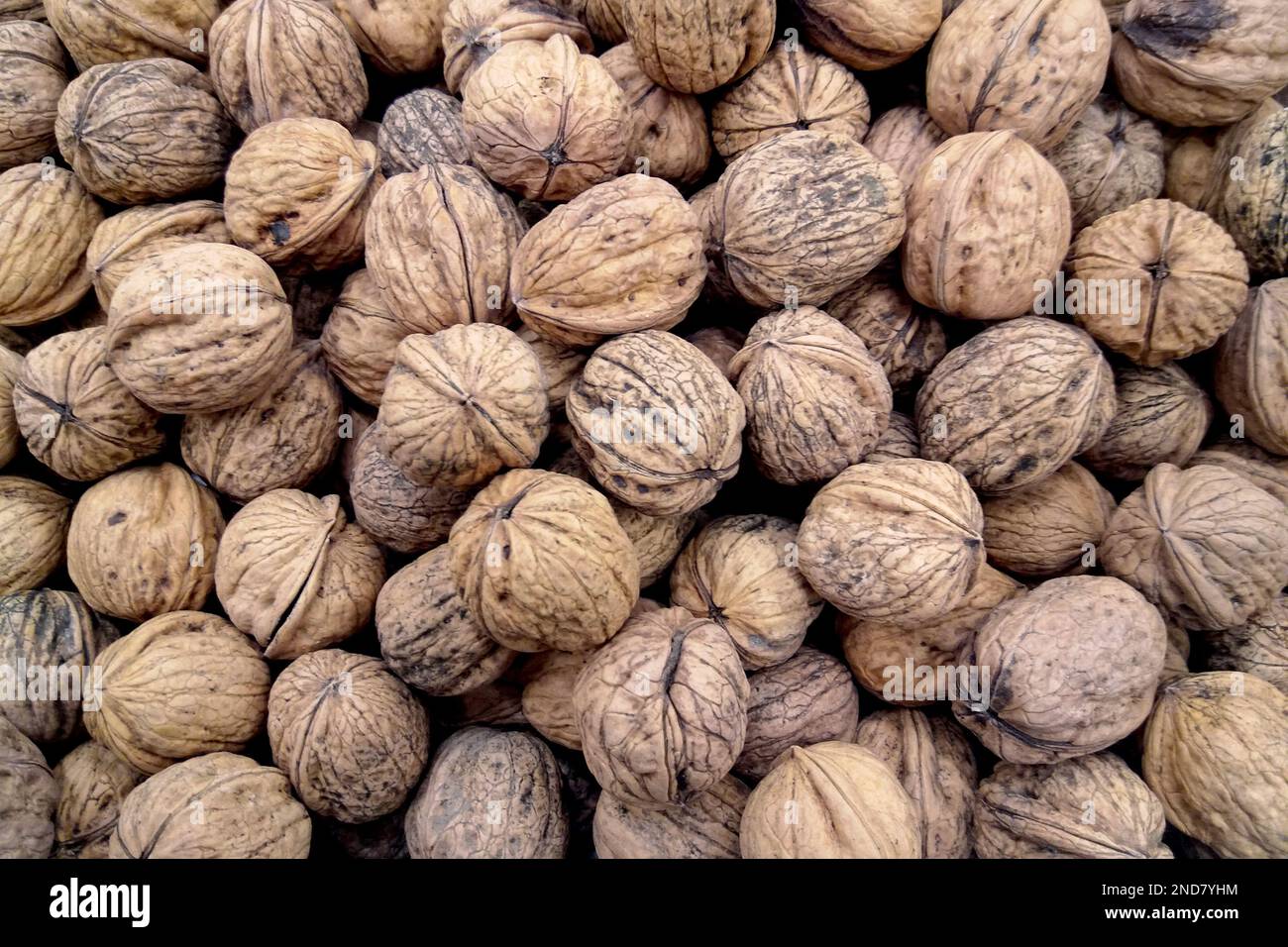 Close-up on a stack of walnuts for sale on a market stall Stock Photo ...