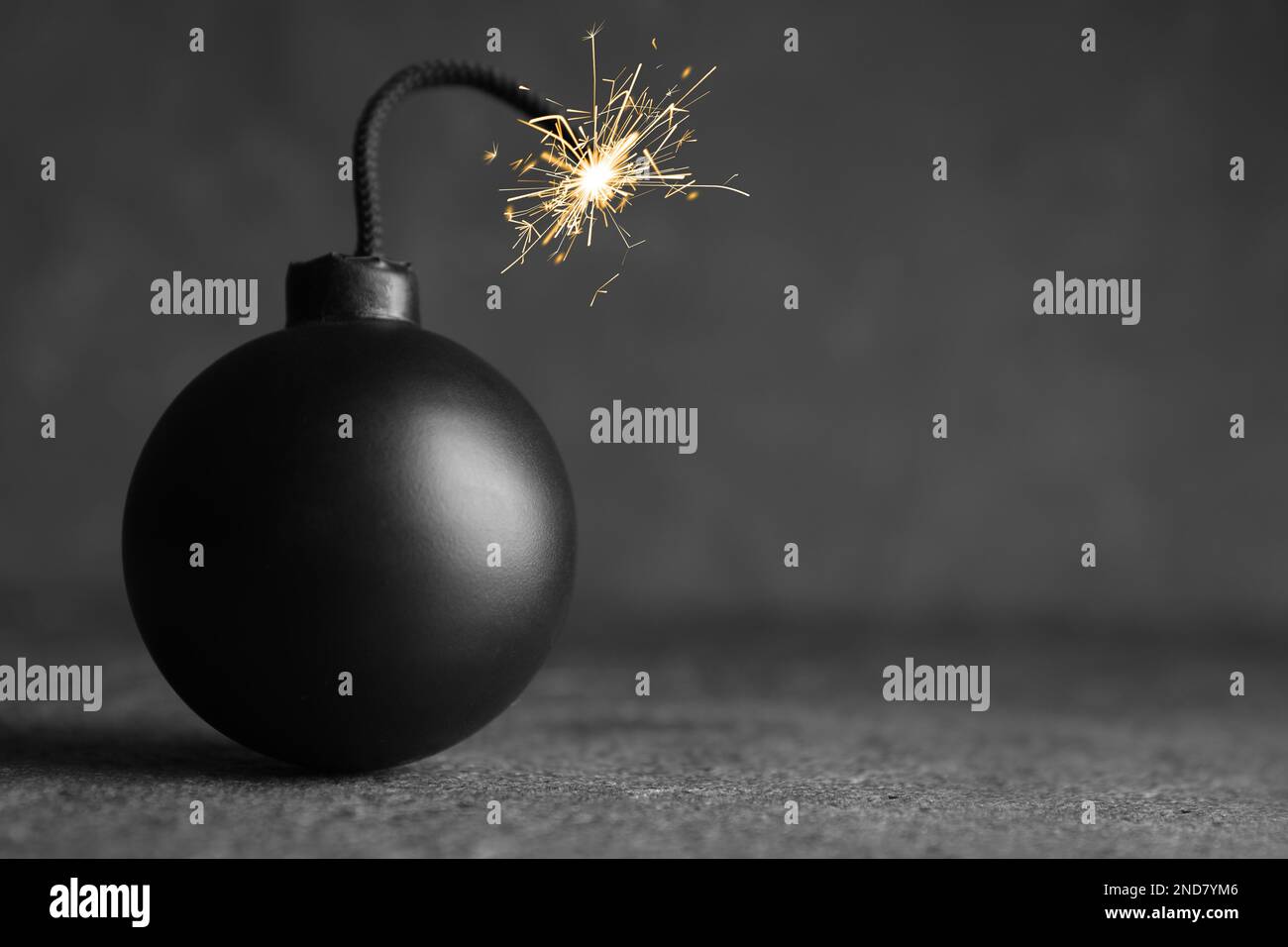 Old fashioned fuse bomb on grey table. Space for text Stock Photo - Alamy