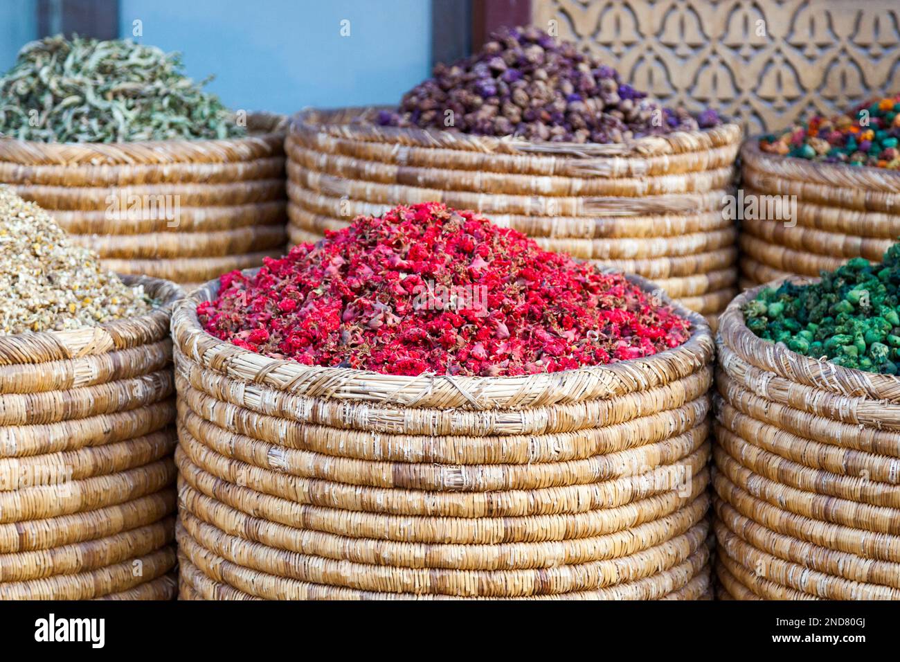 Various spices on display in baskets outside of a spice shop in the ...