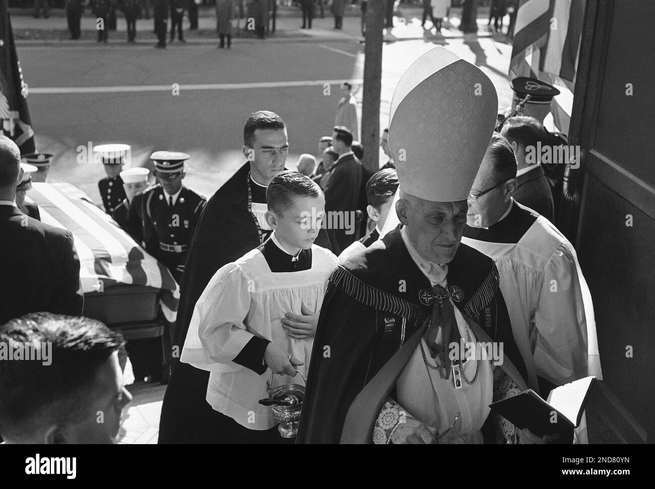 Cardinal Richard Cushing precedes the coffin bearing President John F ...