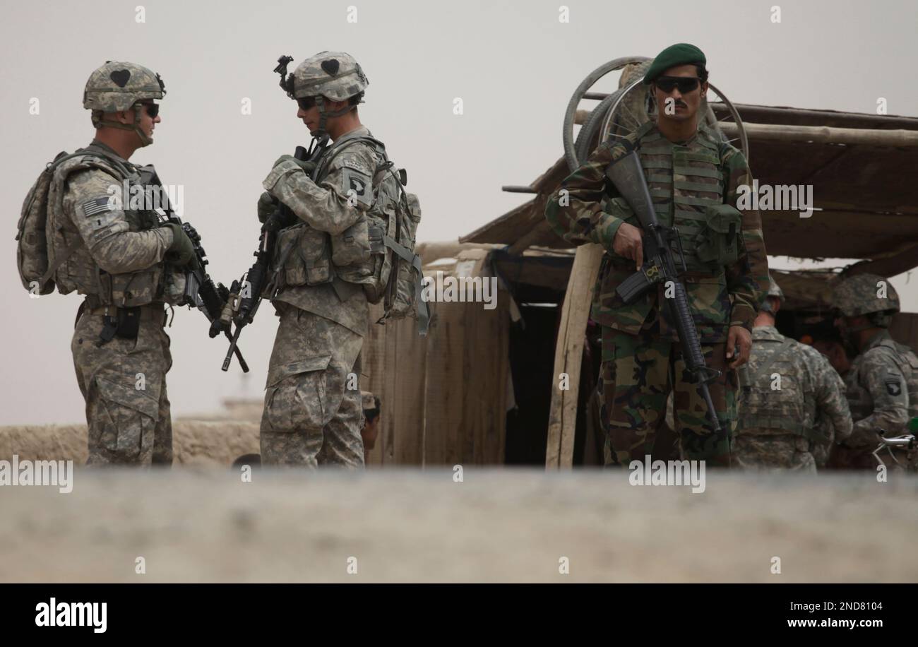 U.S. Army 1st Lt. Andrew Roush, left, of Urbana, Ohio, and Spc. Cody ...