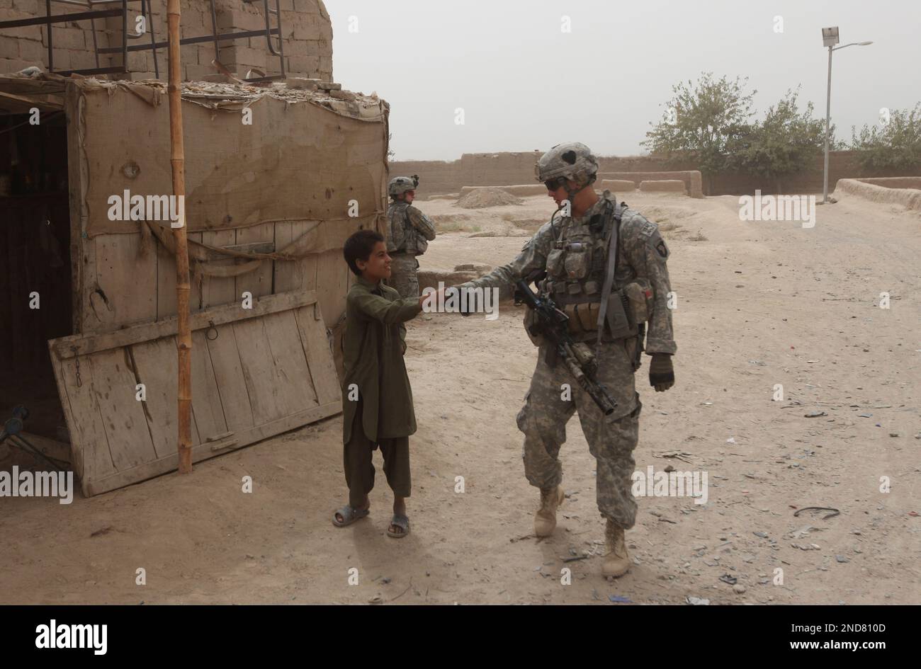 U.S. Army Sgt Derek Slade, left, of Albuquerque, N.M., of Tactical ...