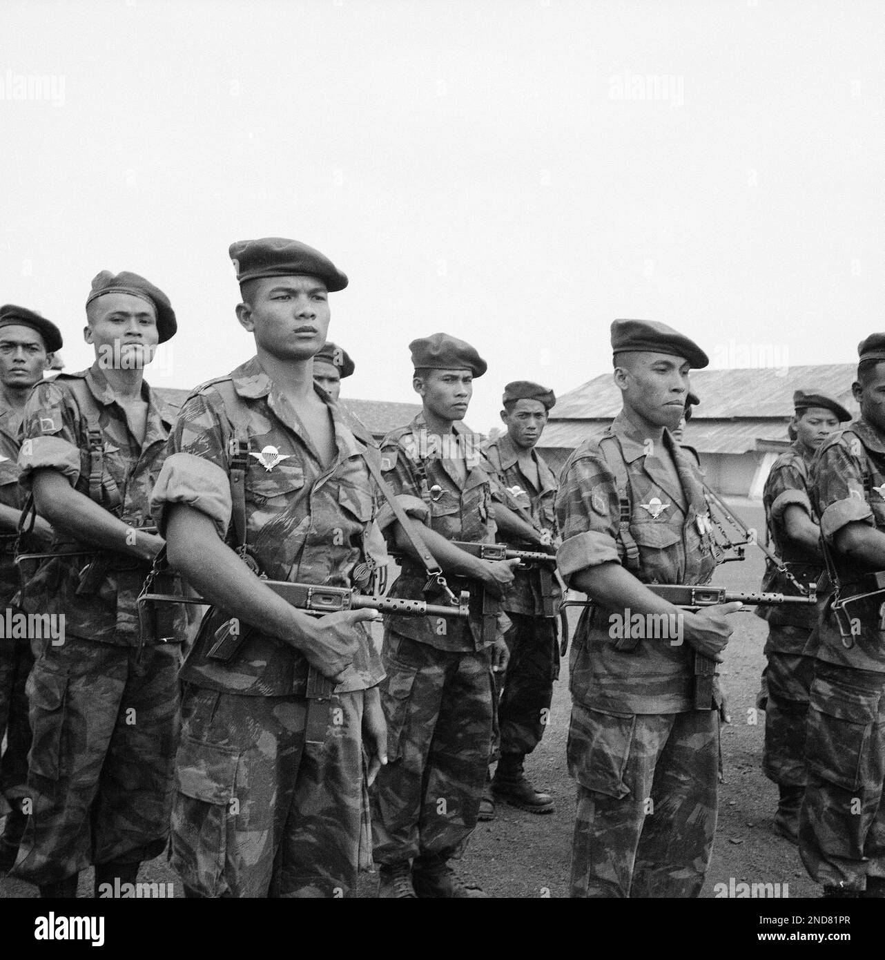 Cambodian paratroopers in full camouflage uniforms and carrying sub ...
