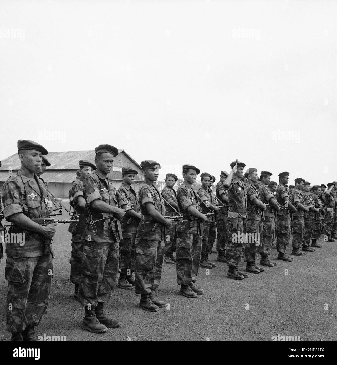 Cambodian paratroopers in full camouflage uniforms and carrying sub ...